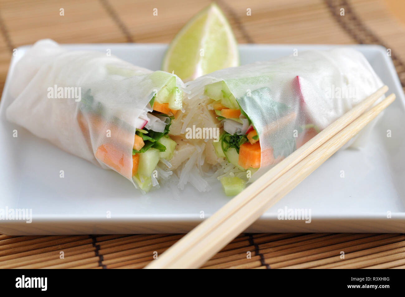Woman eating vietnamese spring rolls hi-res stock photography and ...