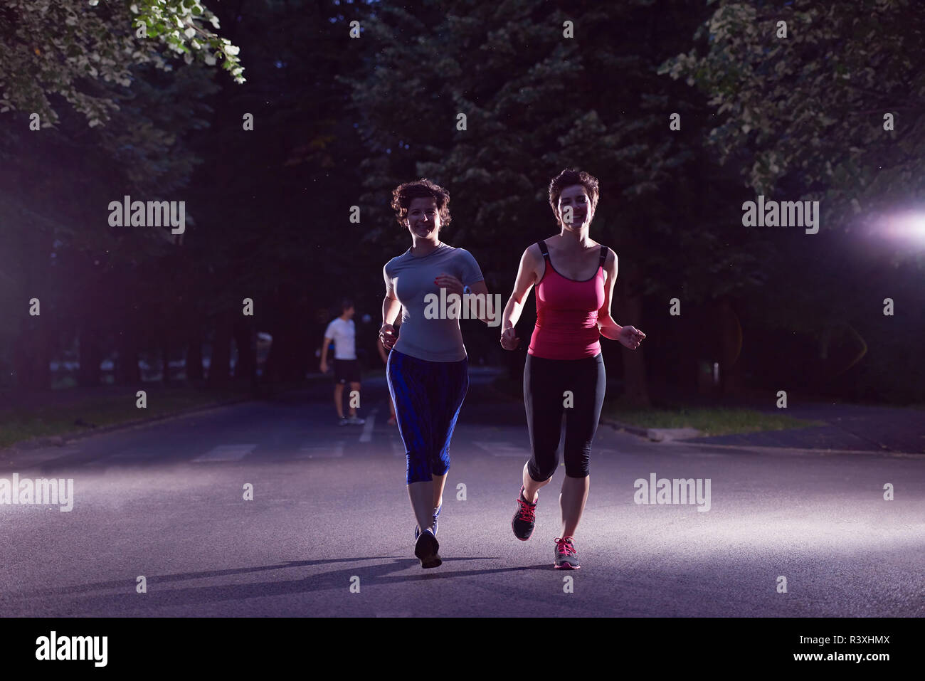 couple jogging at early morning Stock Photo - Alamy