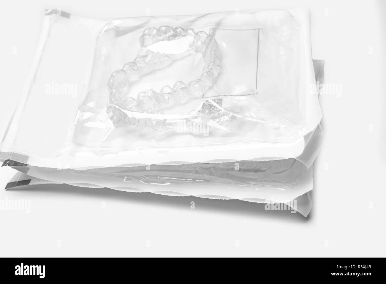 Invisalign package Black and White Stock Photos & Images - Alamy