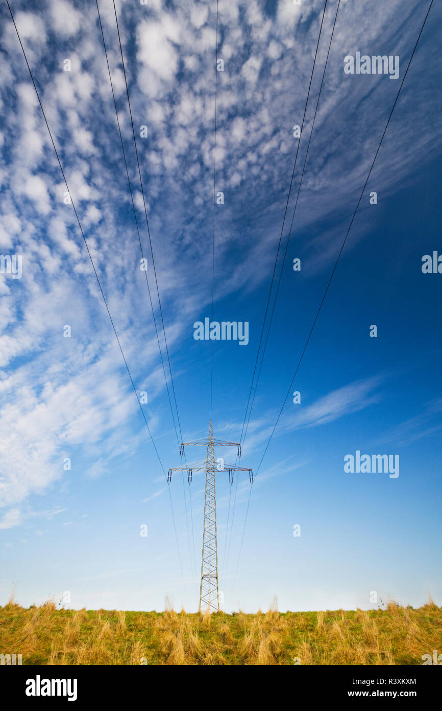 An electricity pylon seen from a low angle Stock Photo - Alamy