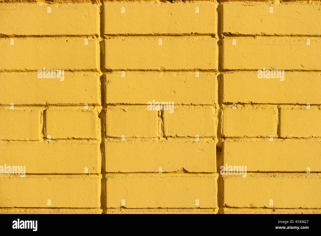 Yellow brick wall texture Stock Photo - Alamy