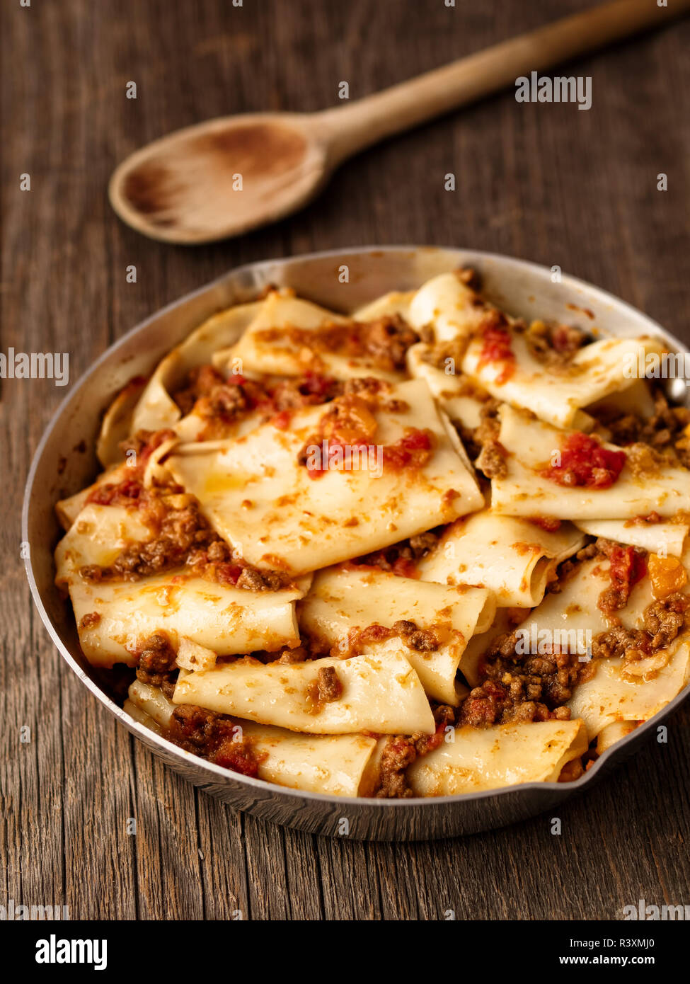 rustic italian pasta in ragu sauce Stock Photo - Alamy
