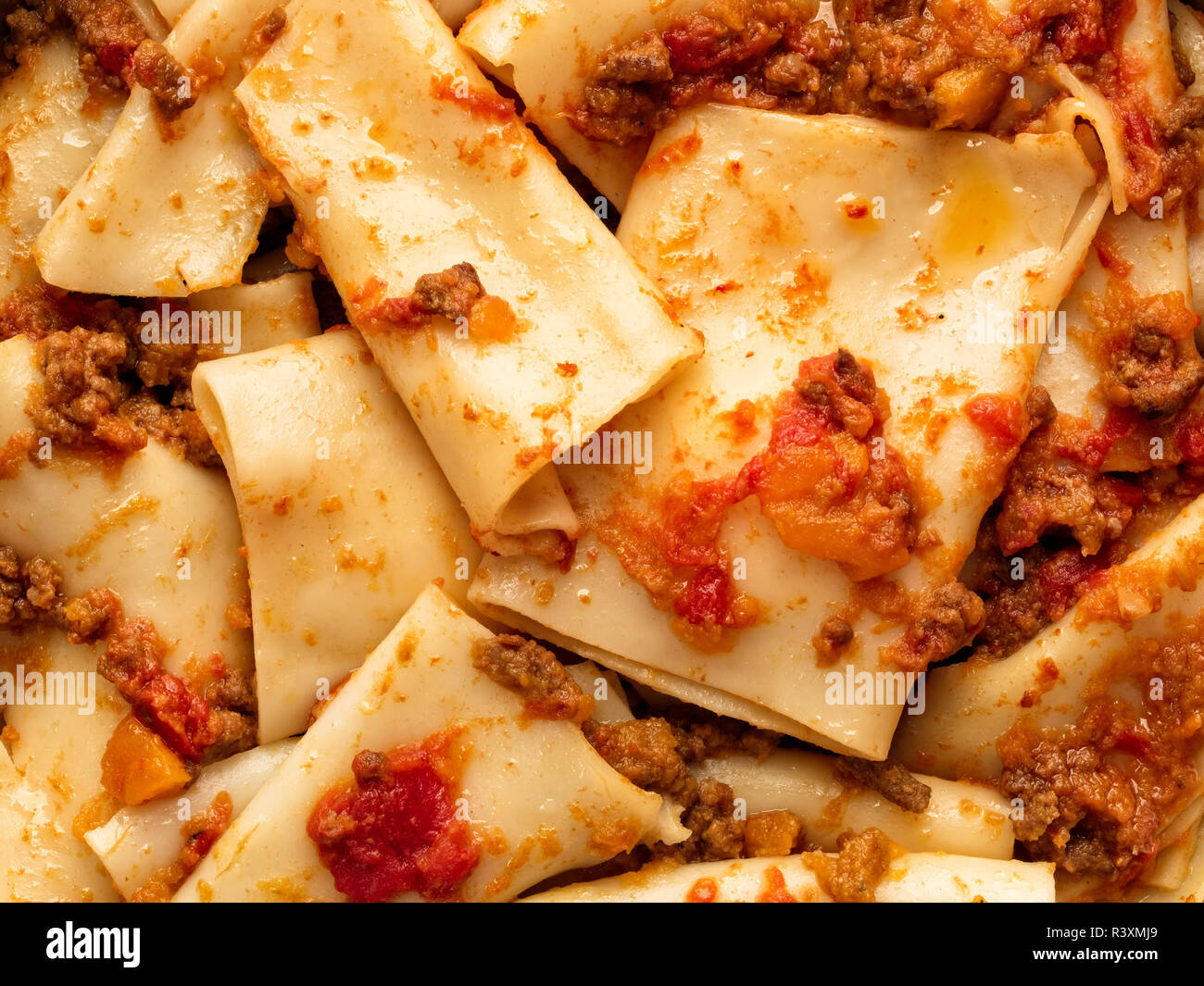 rustic italian pasta in ragu sauce food background Stock Photo - Alamy