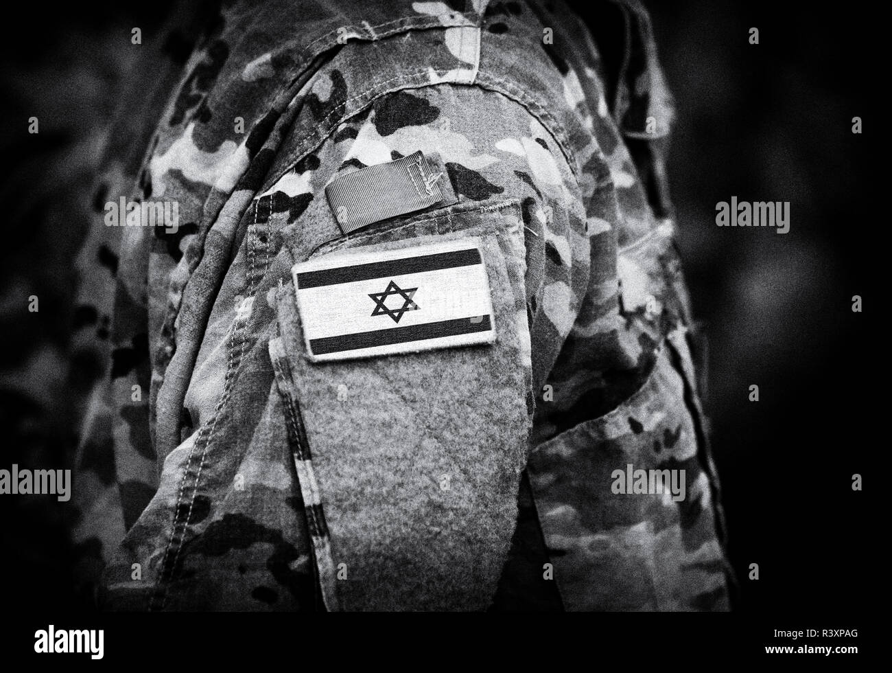 Israel flag on soldiers arm (collage Stock Photo - Alamy