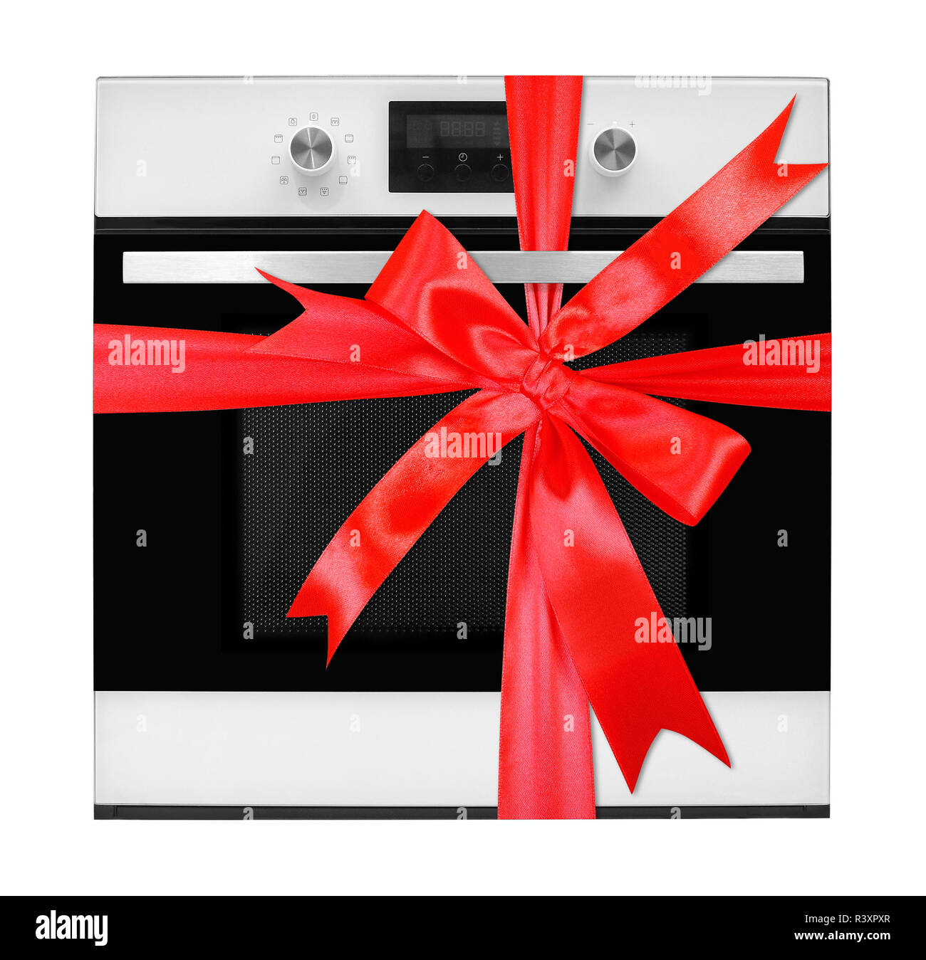 The electric oven gift tied red bow on a white background. It is ...