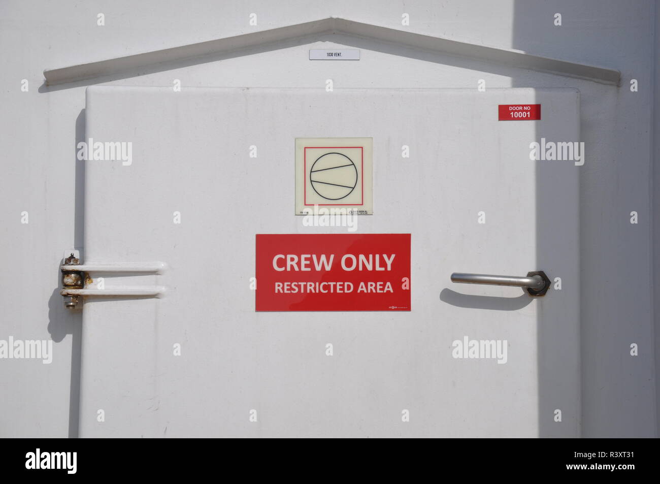 door metal door sign crew only ship Stock Photo - Alamy