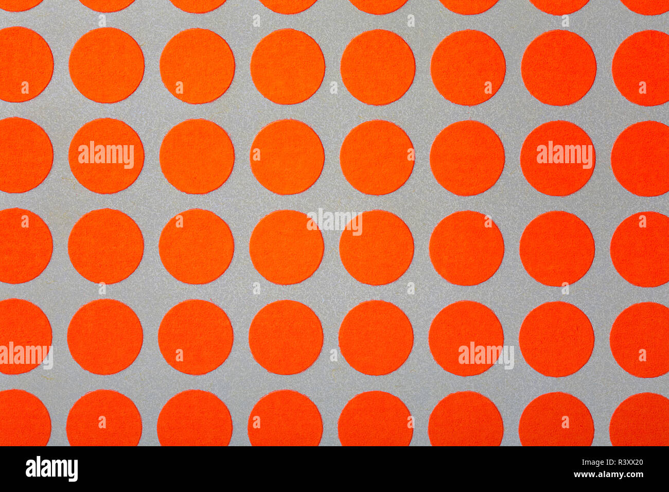 Orange fluorescent dots Stock Photo - Alamy