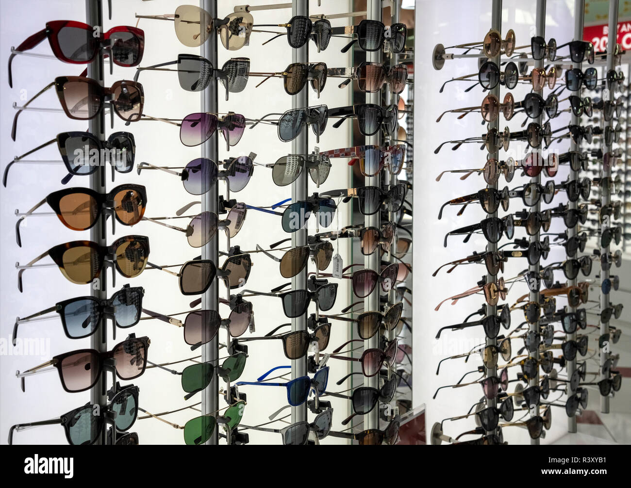 A Many Sunglasses on a shop window Stock Photo - Alamy