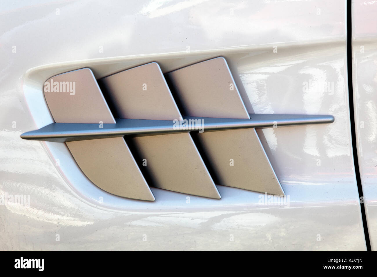 Close-up detail of side vents on late model Mercedes sports car ...