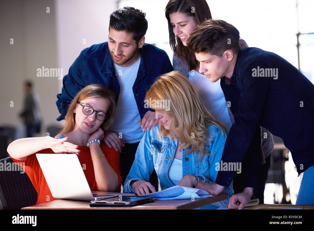 students group working on school project together Stock Photo - Alamy