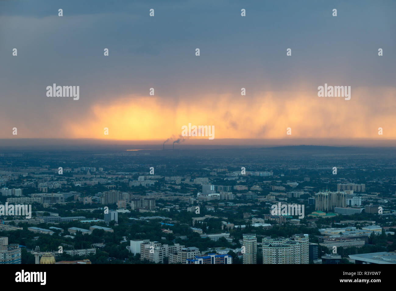 Almaty Skyline during a Sunset Rain, Kazakhstan in August 2018 taken in ...