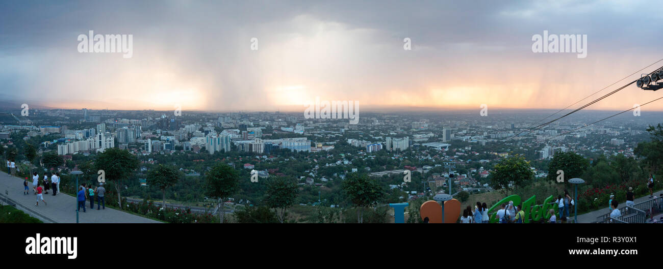 Almaty Skyline during a Sunset Rain, Kazakhstan in August 2018 taken in ...
