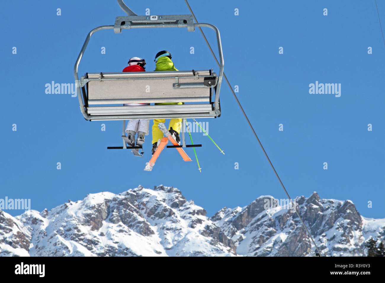 couple in a chair lift Stock Photo - Alamy