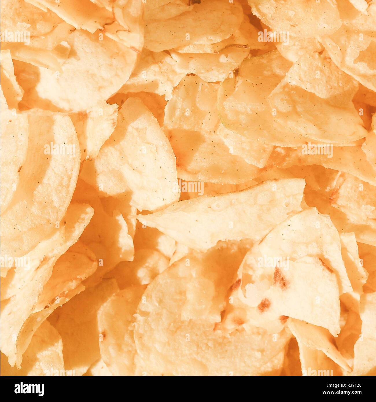 Retro looking Potato chips crisps Stock Photo - Alamy