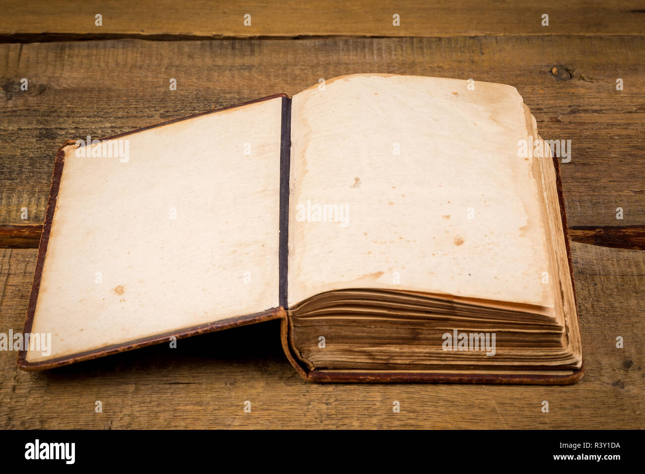 Old burned book cover hi-res stock photography and images - Alamy