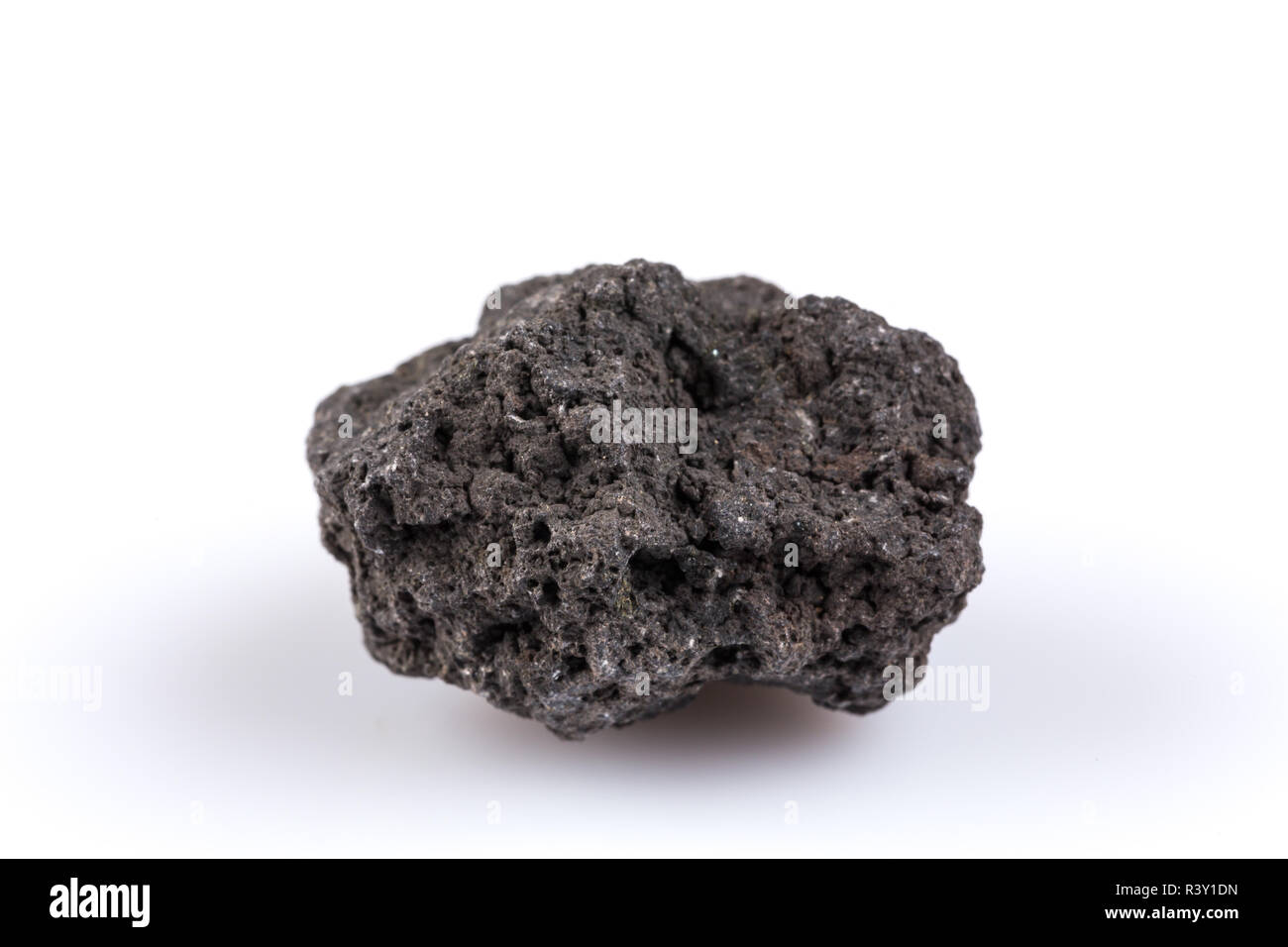 Volcanic stones on a white background Stock Photo - Alamy