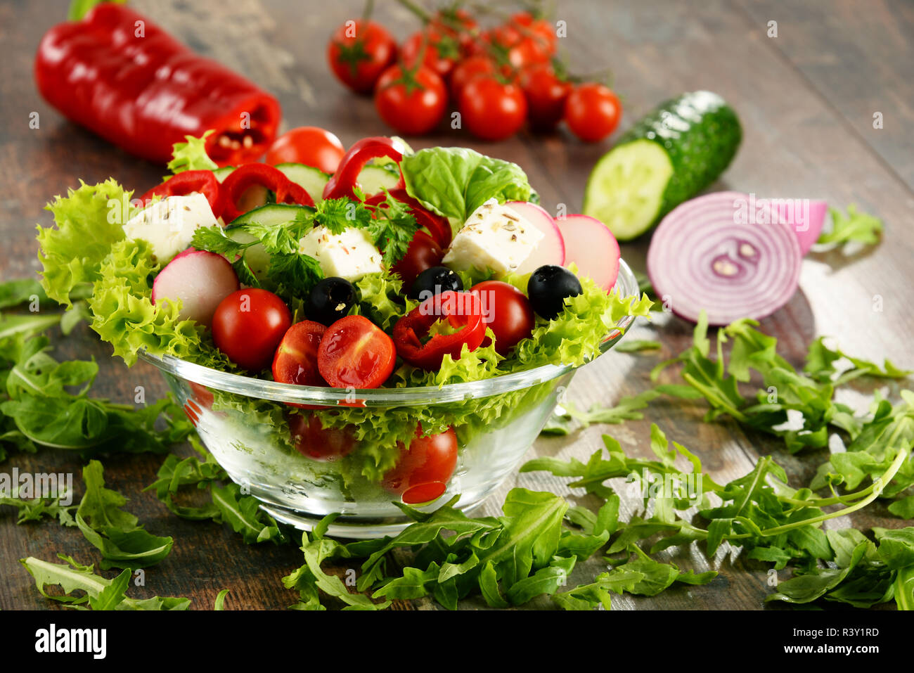 Vegetable salad bowl on kitchen table. Balanced diet Stock Photo - Alamy