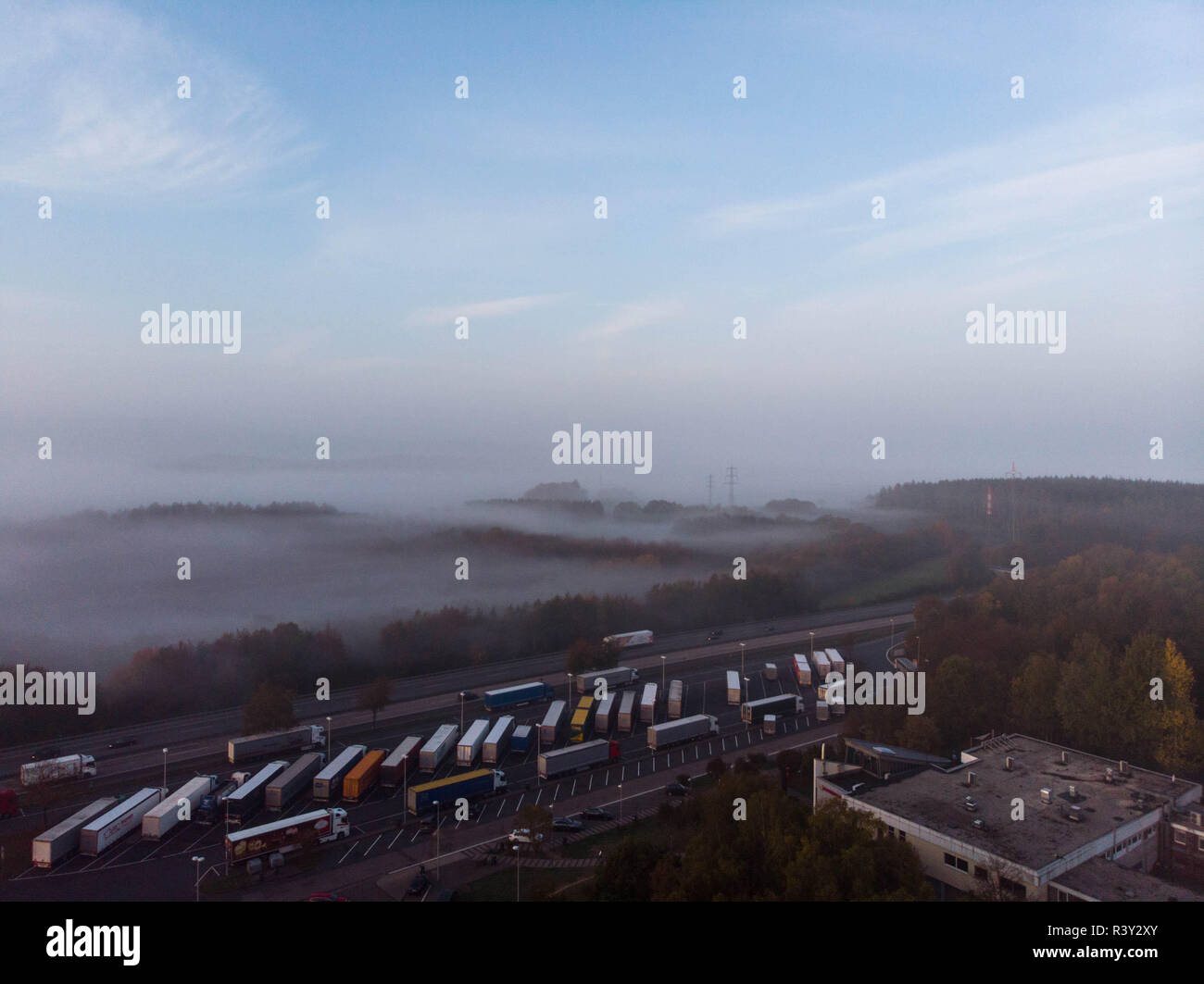 aerial view of a parking lot for trucks on the freeway in germany Stock ...
