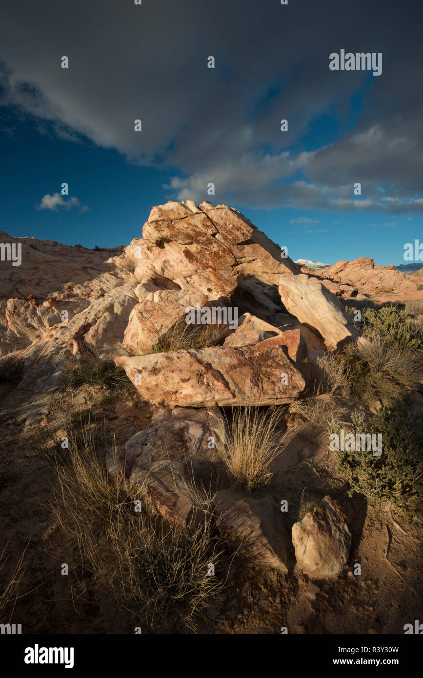 USA, Nevada. Geological formations with clouds at sunset, Gold Butte ...