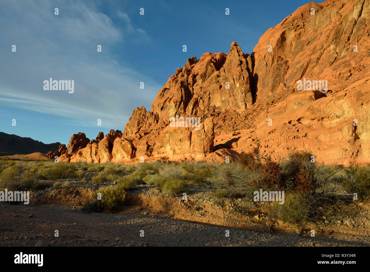 USA, Nevada. Valley of Fire State Park, Sandstone cliffs above a wash ...