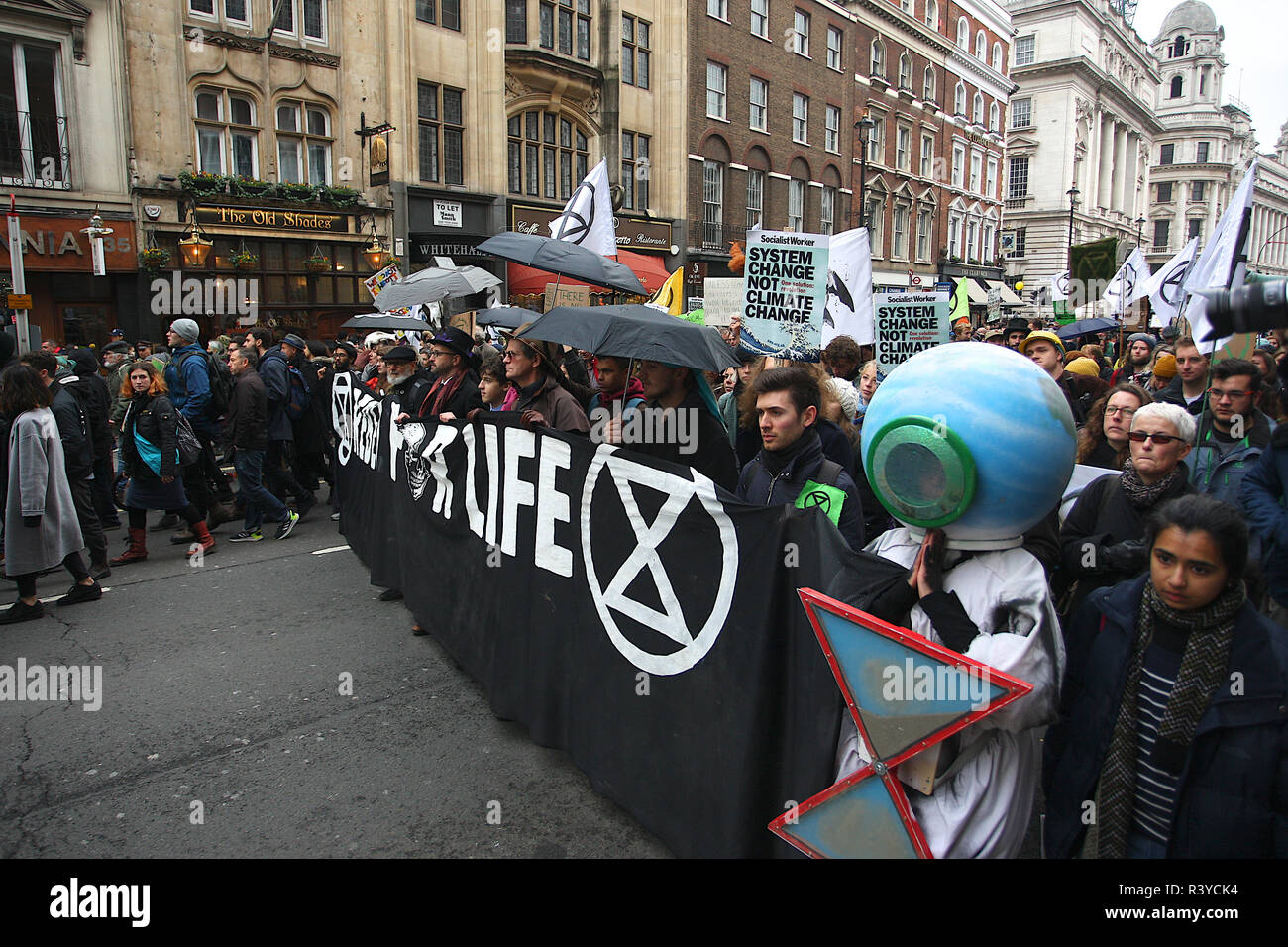 London, UK. 24th November 2018. Extinction Rebellion Campaigners march ...