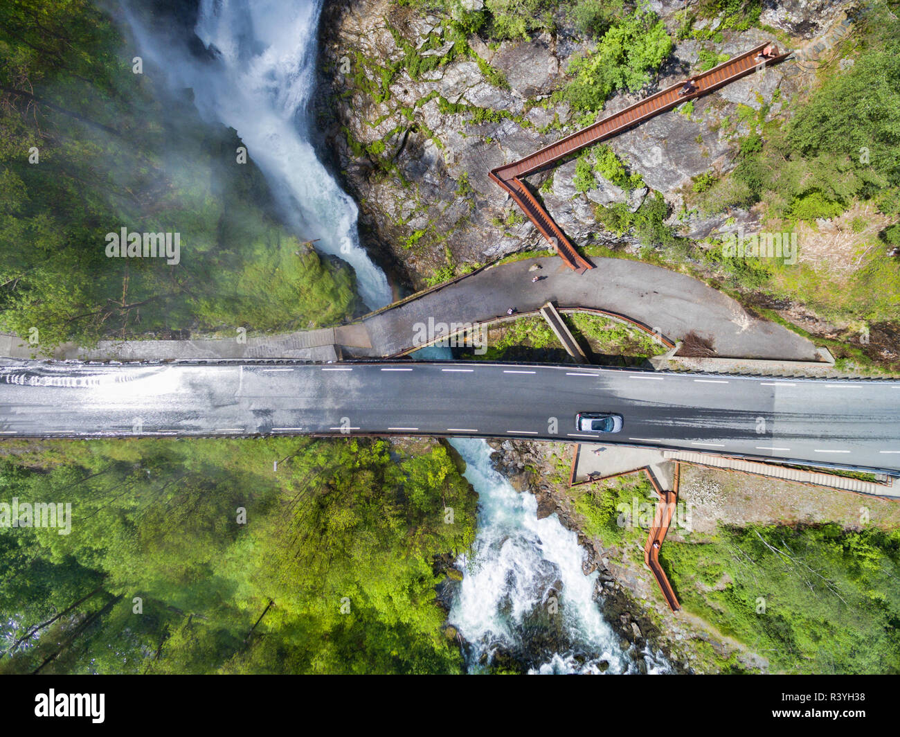 Bridge over waterfall Stock Photo - Alamy