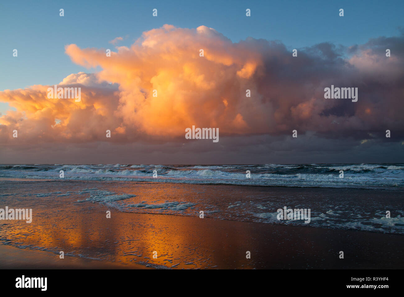 Storm front approaching over the sea after sunset: threatening red ...