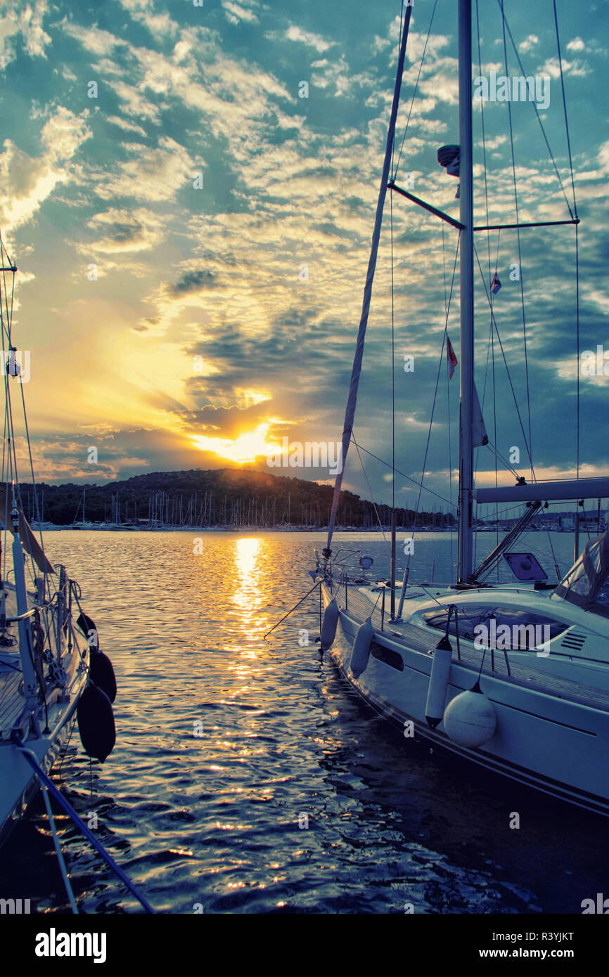 Sailing ship luxury yacht boat in the Sea during amazing sunset Stock ...