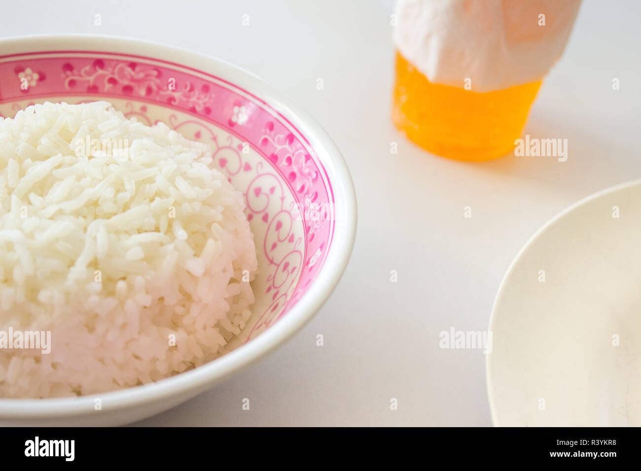 Woman eating rice pudding hi-res stock photography and images - Alamy