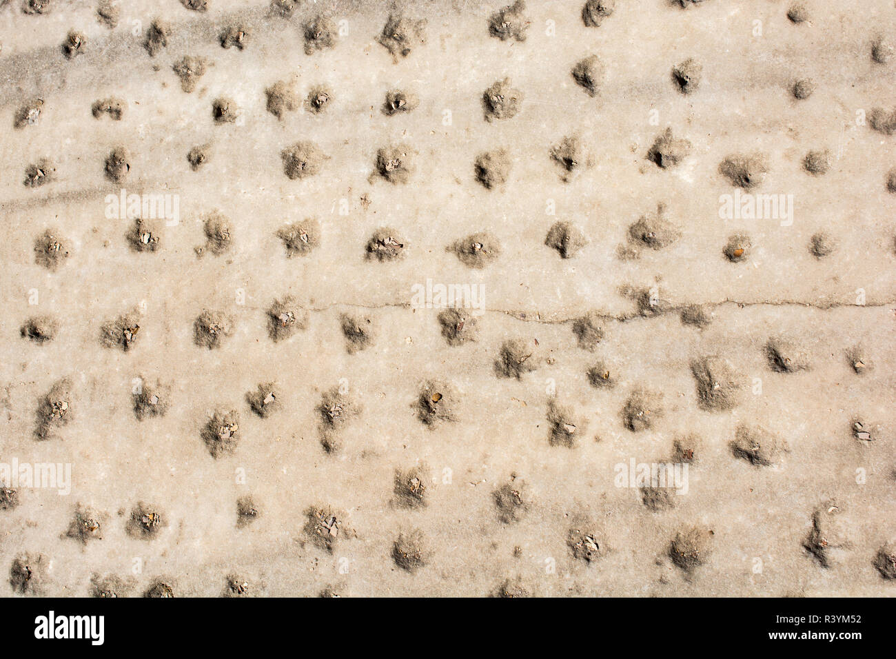 Natural rock or Stone with a dented surface as background Stock Photo ...