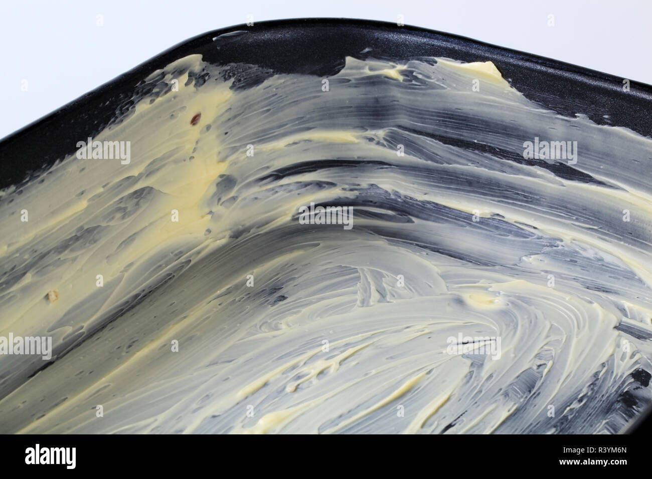 buttered baking pan Stock Photo - Alamy