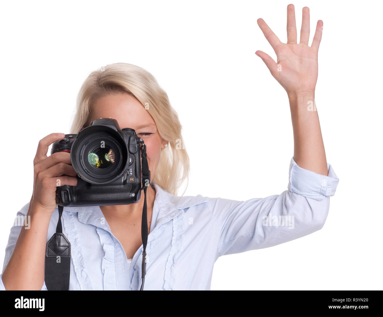 photographer with camera holding up a hand Stock Photo - Alamy