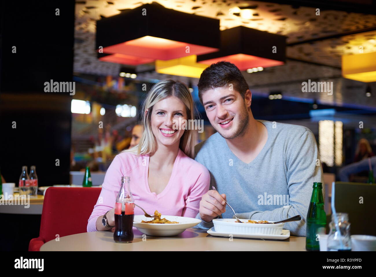 couple having lunch break in shopping mall Stock Photo - Alamy