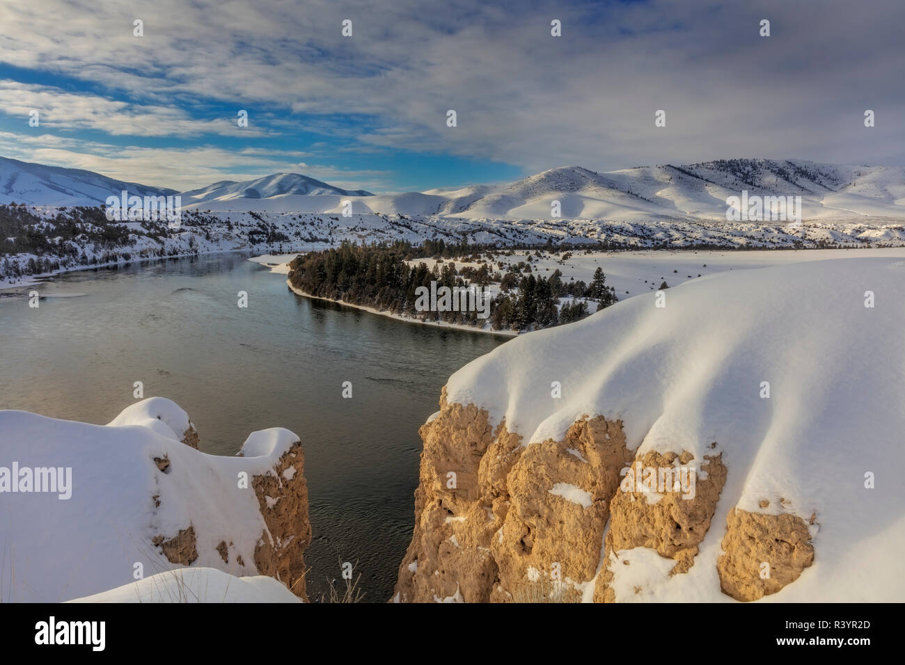 Fresh snowfall on clay cliffs above the Flathead River in the Mission ...