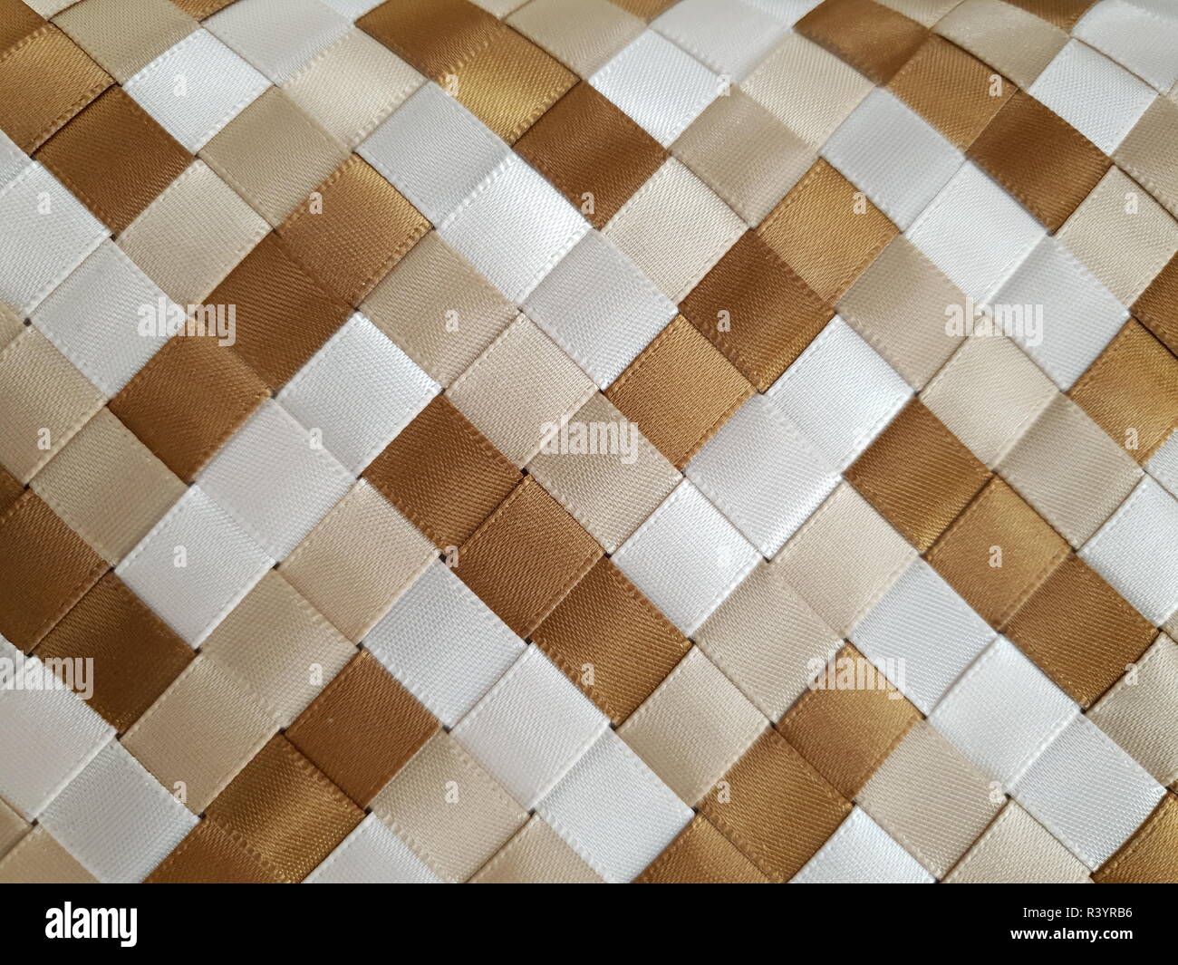 cubed satin ribbons of blue brown blue weaving ribbons Stock Photo - Alamy