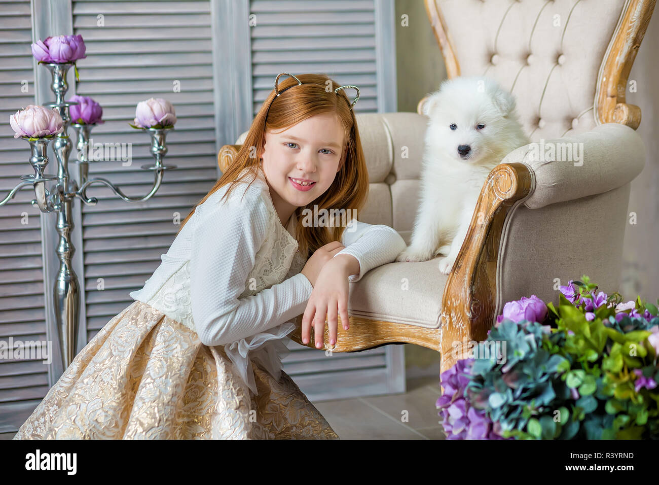 Portrait of ginger hair girl play with husky poppy.Model girl with red ...