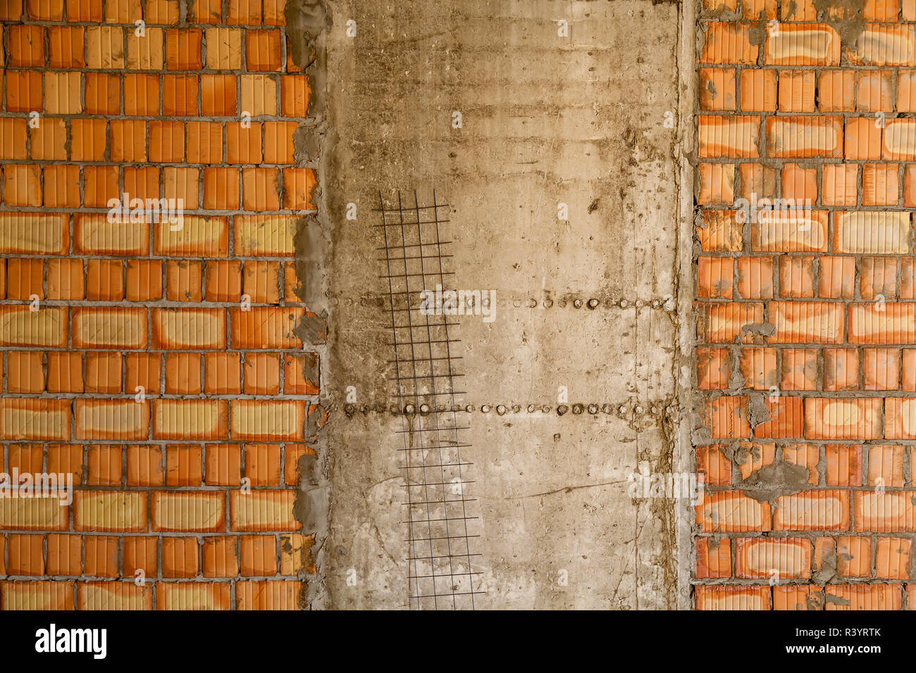 Bricklaying of walls in a high-rise building. Interior and exterior ...