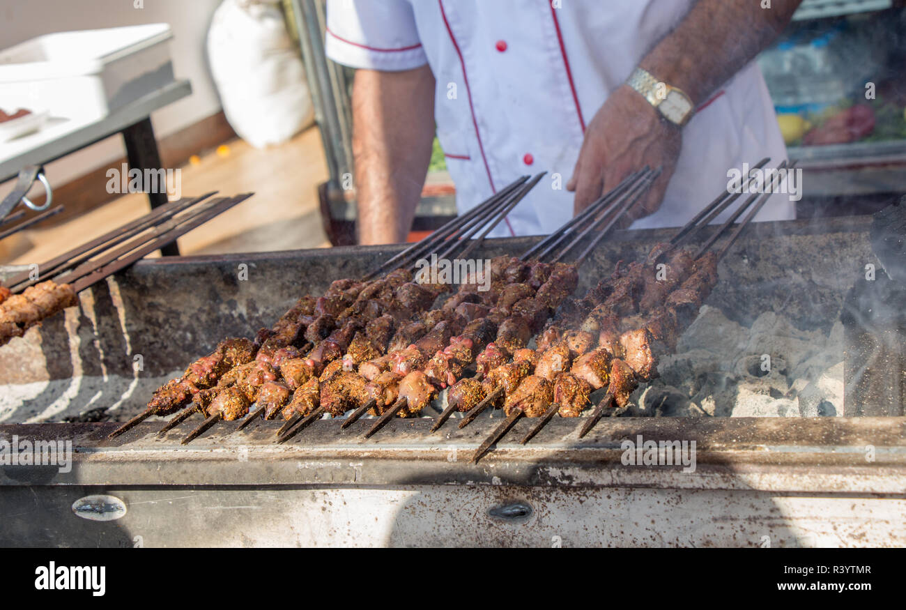 Turkish style meat shashlyk being grilled on grill Stock Photo - Alamy