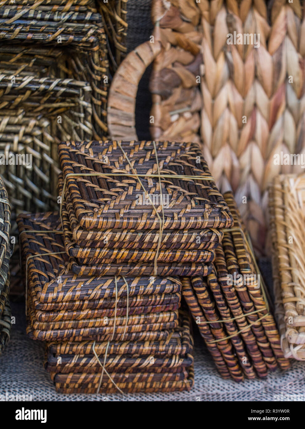A bunch of hand made straw boxes in the view Stock Photo - Alamy
