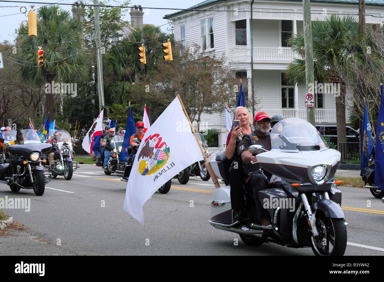 U.S. Veterans Day Parade of Motorcycles with Flags Flying Stock Photo ...