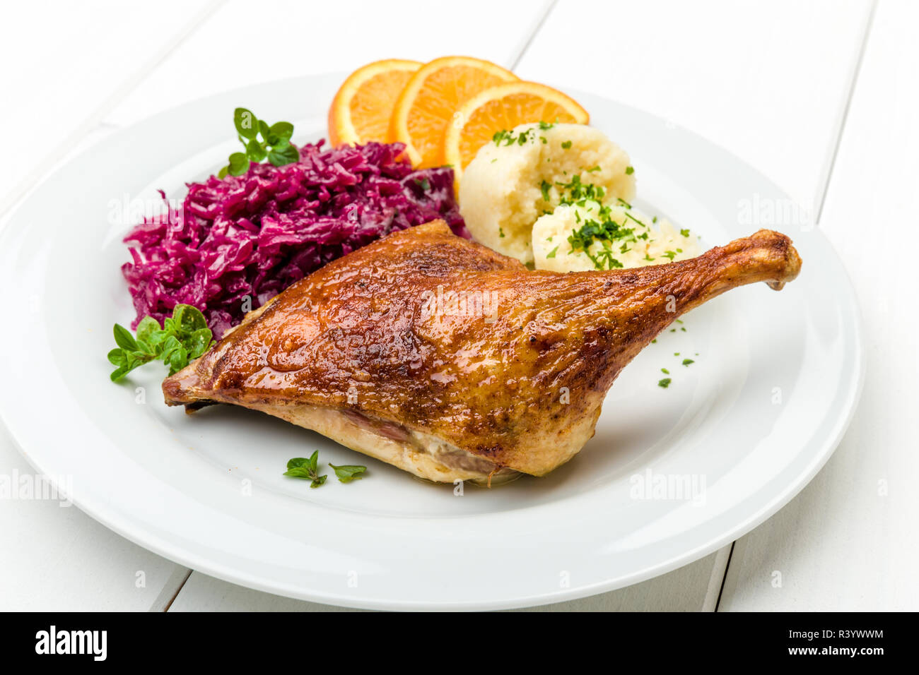 duck with dumplings and red cabbage Stock Photo - Alamy