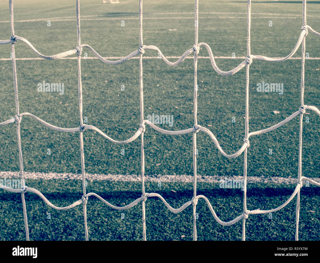 Frame of football gate, white gate net on background of a green ...