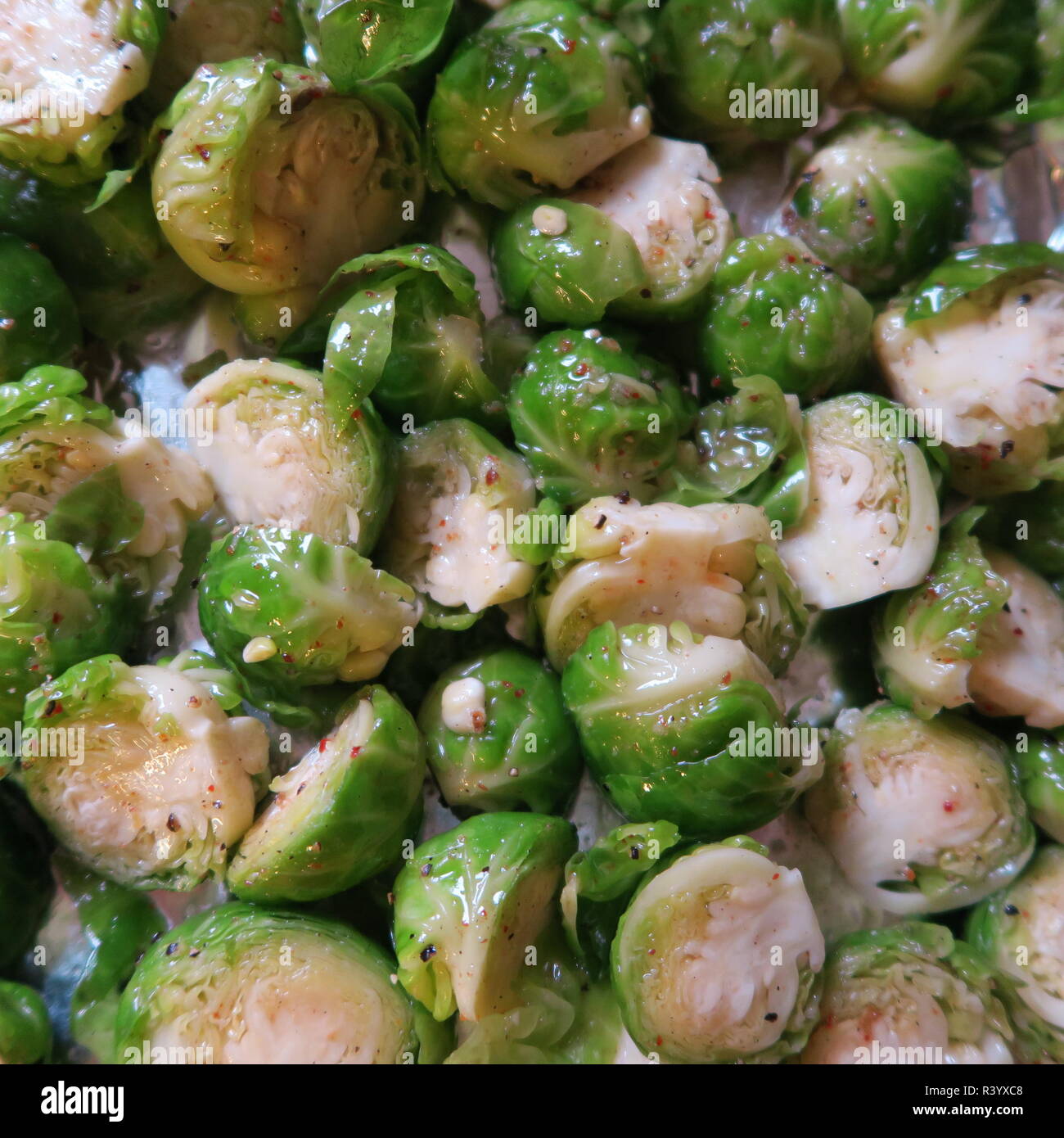 with spices marinated Brussels sprouts Stock Photo - Alamy