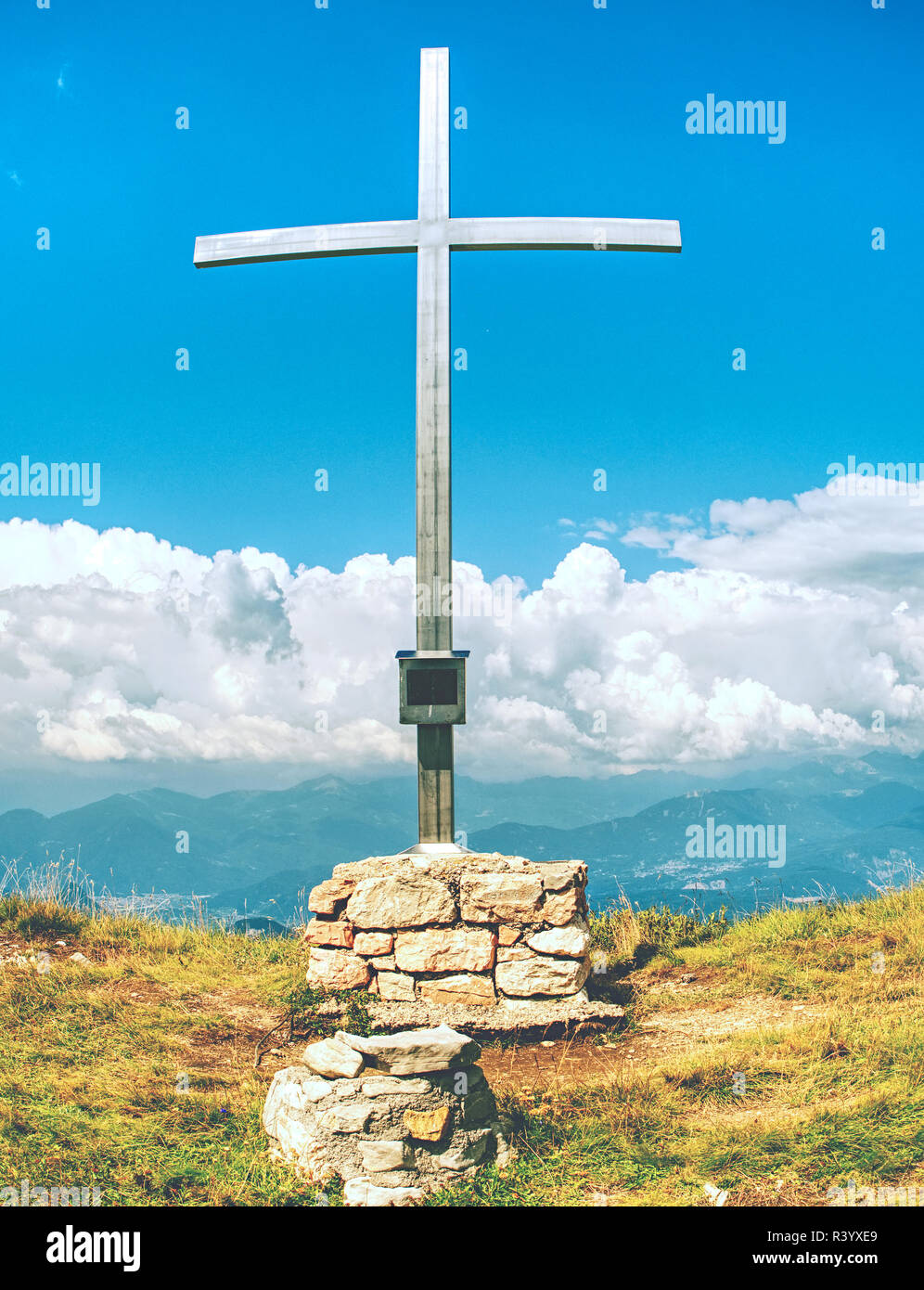 Summit cross on the mountain peak in the Italien alps Stock Photo - Alamy