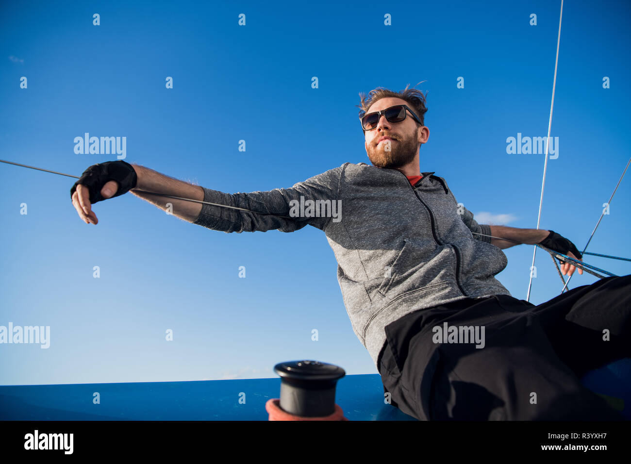 Handsome man resting On Yacht in the open sea on cruise Stock Photo - Alamy