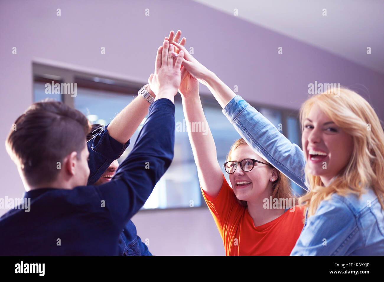 happy students celebrate Stock Photo - Alamy