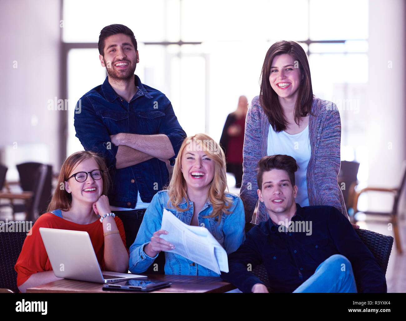 students group standing together as team Stock Photo - Alamy