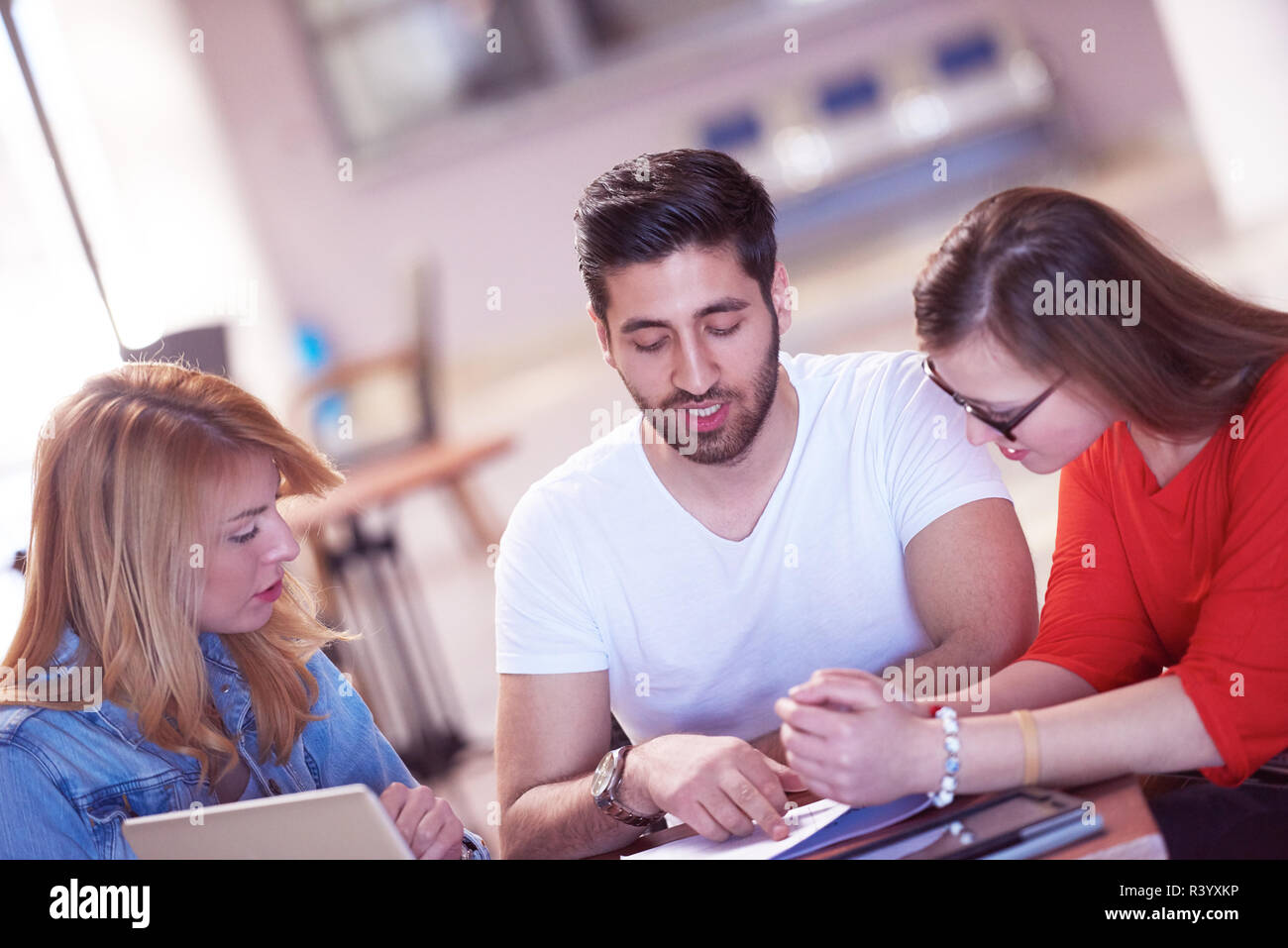 students group working on school project together Stock Photo - Alamy