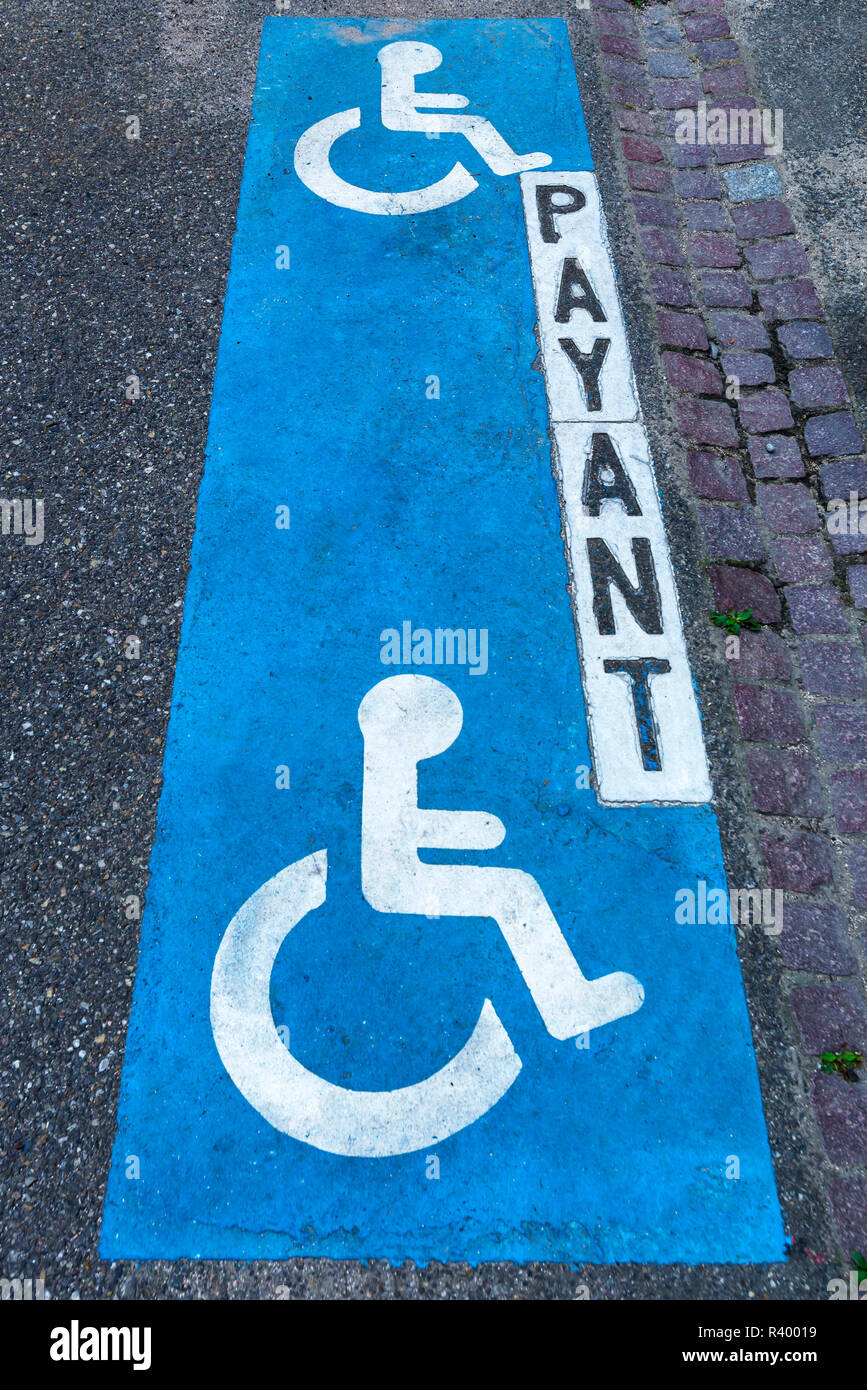 Signs on asphalt, Parking for people with disabilities, Alsace, France ...