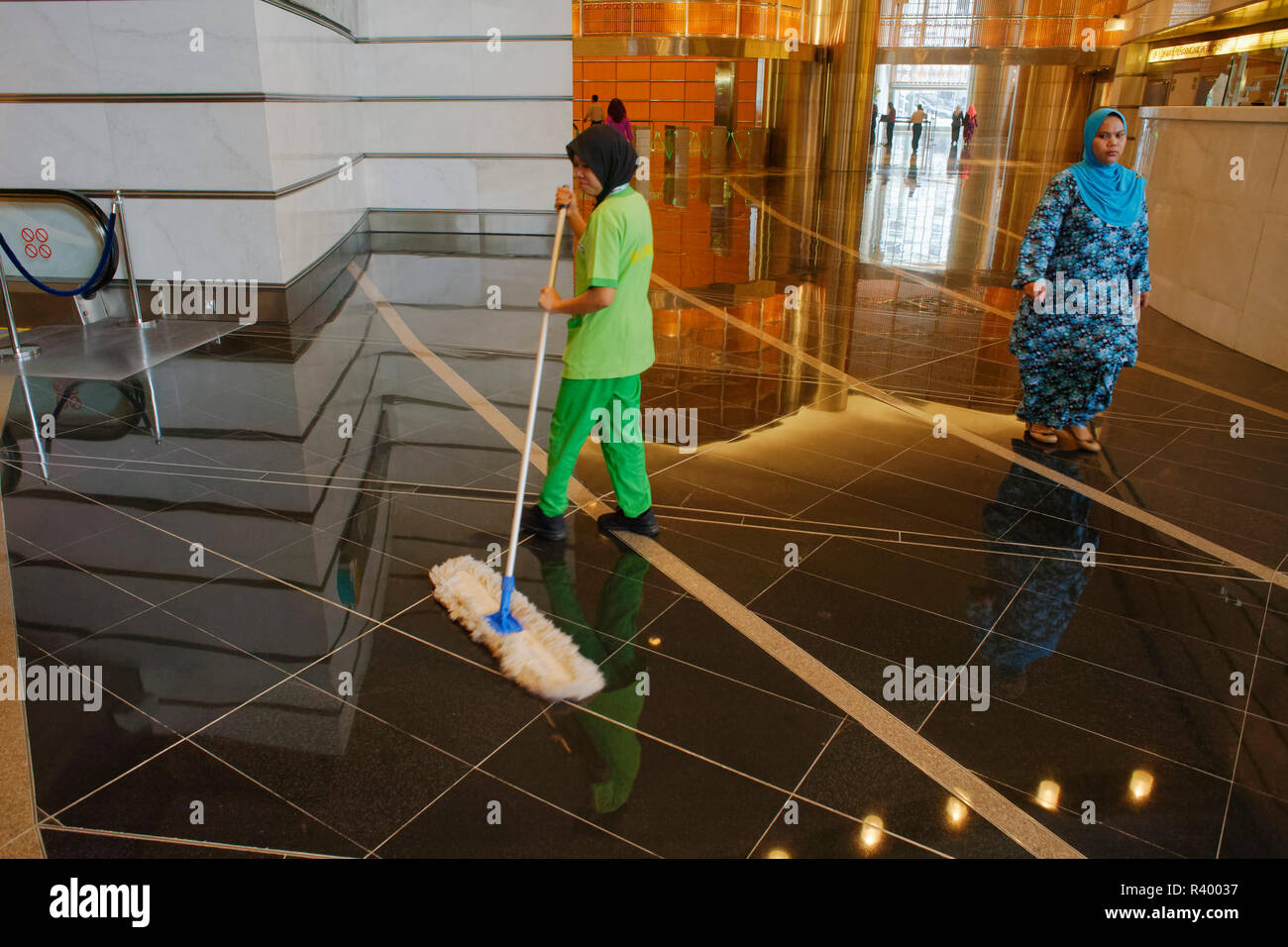 cleaning the marble floor inside KLCC building,Kuala Lumpur, Malaysia ...
